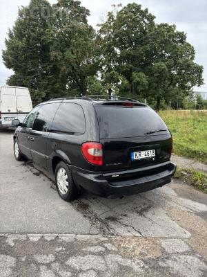 Black Chrysler Grand Voyager 2007 in Riga, with an engine capacity of 2.80 L and mileage of 287 thousand km for 2200 €, photo 4 on AUTOMOTO.COM.LV