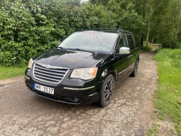 Melns Chrysler Grand Voyager 2008 Rīga, ar dzinēja tilpumu 2.80 L un nobraukumu 245 tūkst. km par 4900 €, foto 1 vietnē AUTOMOTO.COM.LV