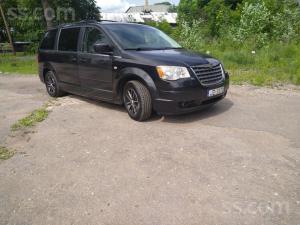Black Chrysler Grand Voyager 2008 in Riga, with an engine capacity of 2.80 L and mileage of 367 thousand km for 3099 €, photo  on AUTOMOTO.COM.LV