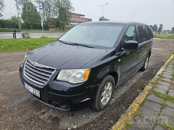 Black Chrysler Grand Voyager 2008 in Riga, with an engine capacity of 2.80 L and mileage of 329 thousand km for 2999 €, photo 2 on AUTOMOTO.COM.LV