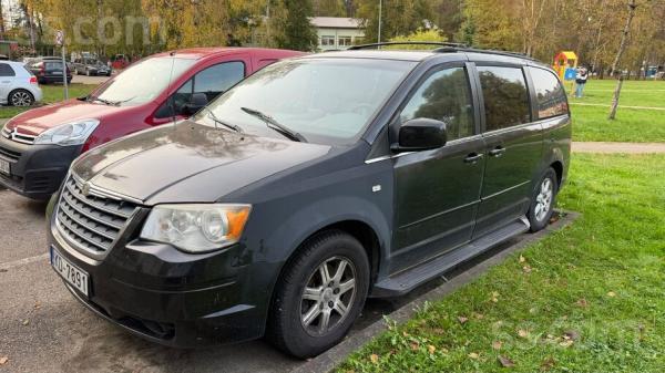 Black Chrysler Grand Voyager 2008 in Riga, with an engine capacity of 3.30 L and mileage of 189 thousand km for 2300 €, photo 4 on AUTOMOTO.COM.LV