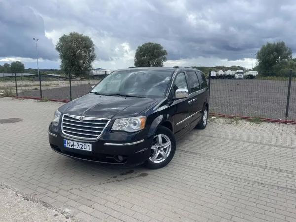 Black Chrysler Grand Voyager 2009 in Riga, with an engine capacity of 2.80 L and mileage of 295 thousand km for 3550 €, photo 1 on AUTOMOTO.COM.LV