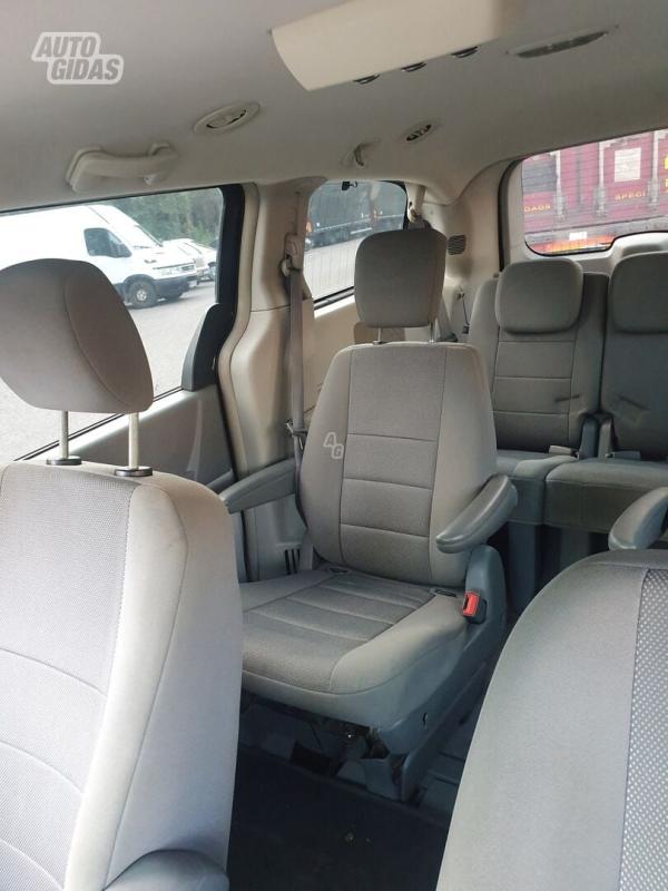 Black Chrysler Grand Voyager 2009 in Vilnius, with an engine capacity of 2.80 L and mileage of 315 thousand km for 1499 €, photo 6 on AUTOMOTO.COM.LV