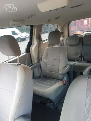 Black Chrysler Grand Voyager 2009 in Vilnius, with an engine capacity of 2.80 L and mileage of 315 thousand km for 1499 €, photo 7 on AUTOMOTO.COM.LV