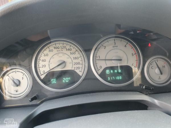 Black Chrysler Grand Voyager 2009 in Vilnius, with an engine capacity of 2.80 L and mileage of 315 thousand km for 1499 €, photo 7 on AUTOMOTO.COM.LV