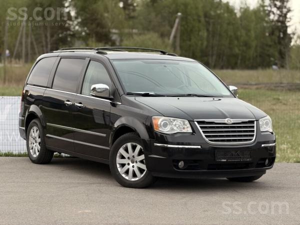 Black Chrysler Grand Voyager 2011 in Ogre, with an engine capacity of 2.80 L and mileage of 256 thousand km for 7750 €, photo 3 on AUTOMOTO.COM.LV