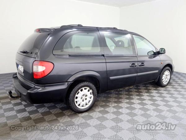Black Chrysler Grand Voyager 2006 in Tallinn, with an engine capacity of 2.80 L and mileage of 337 thousand km for 799 €, photo 3 on AUTOMOTO.COM.LV