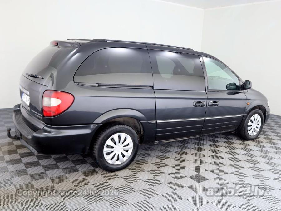 Melns Chrysler Grand Voyager 2006 Tallina, ar dzinēja tilpumu 2.80 L un nobraukumu 259 tūkst. km par 1299 €, foto 4 vietnē AUTOMOTO.COM.LV