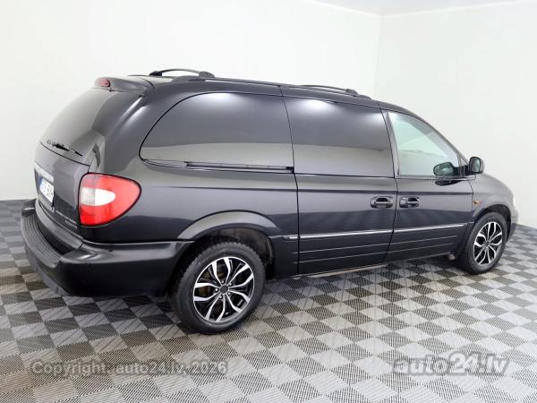 Black Chrysler Grand Voyager 2007 in Tallinn, with an engine capacity of 2.80 L and mileage of 265 thousand km for 1599 €, photo 3 on AUTOMOTO.COM.LV