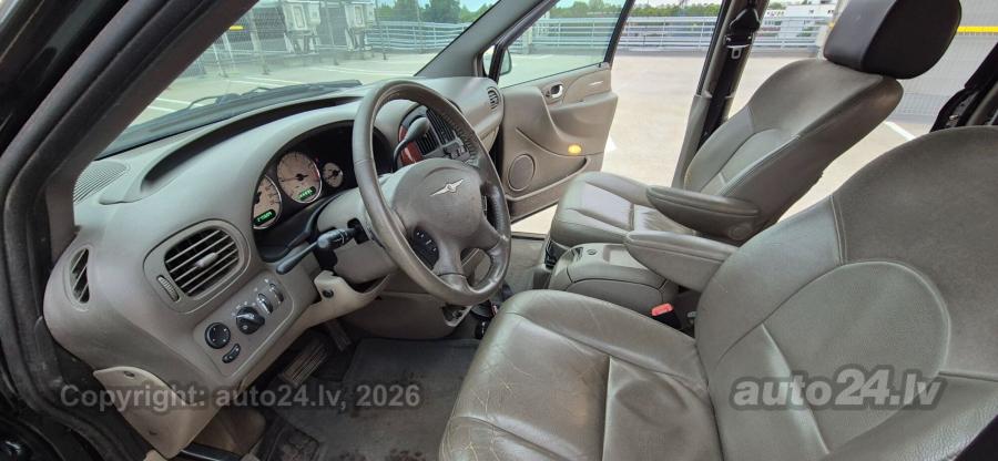 Black Chrysler Grand Voyager 2007 in Tallinn, with an engine capacity of 2.80 L and mileage of 270 thousand km for 2999 €, photo 14 on AUTOMOTO.COM.LV