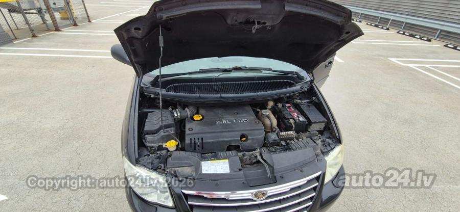 Black Chrysler Grand Voyager 2007 in Tallinn, with an engine capacity of 2.80 L and mileage of 270 thousand km for 2999 €, photo 20 on AUTOMOTO.COM.LV