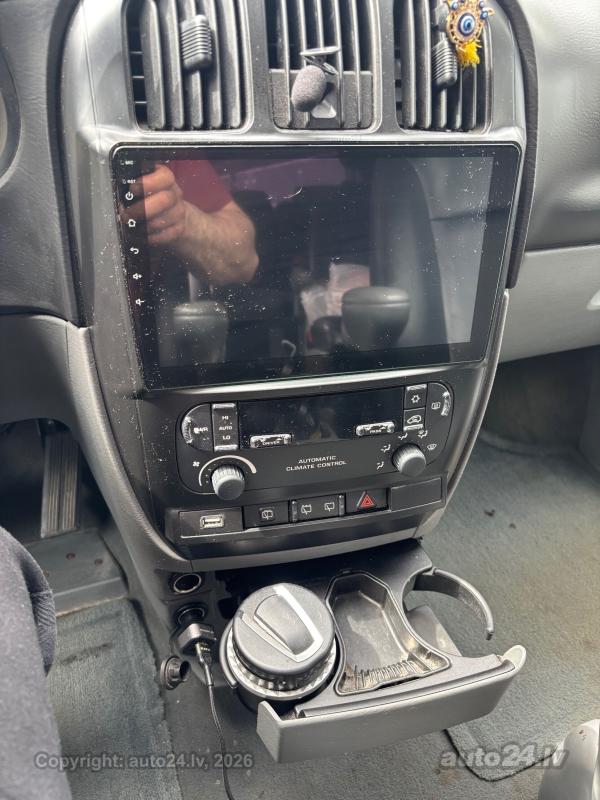 Melns Chrysler Grand Voyager 2007 Tallina, ar dzinēja tilpumu 2.80 L un nobraukumu 263 tūkst. km par 1300 €, foto 7 vietnē AUTOMOTO.COM.LV