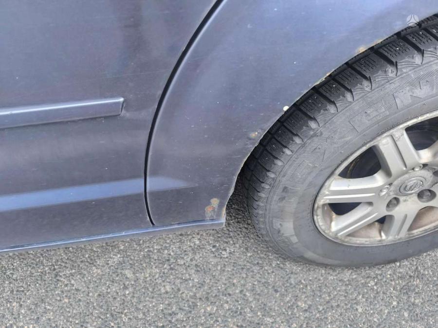 Zils Chrysler Grand Voyager 2008 Viļņa, ar dzinēja tilpumu 2.80 L un nobraukumu 300 tūkst. km par 1200 €, foto 8 vietnē AUTOMOTO.COM.LV