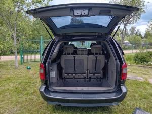 Brown Chrysler Grand Voyager 2005 in Riga, with an engine capacity of 3.30 L and mileage of 220 thousand km for 990 €, photo 4 on AUTOMOTO.COM.LV