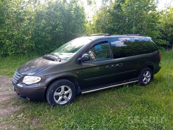 Brown Chrysler Grand Voyager 2005 in Riga, with an engine capacity of 3.30 L and mileage of 220 thousand km for 990 €, photo 9 on AUTOMOTO.COM.LV