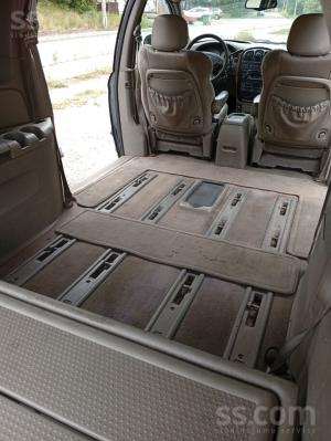 Grey Chrysler Grand Voyager 2002 in Riga, with an engine capacity of 3.80 L and mileage of 300 thousand km for 2000 €, photo 8 on AUTOMOTO.COM.LV