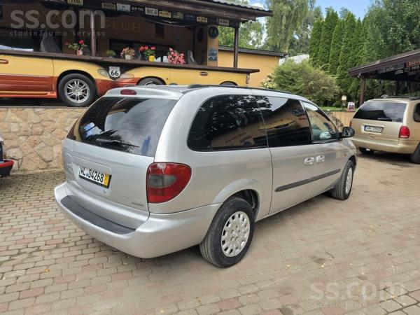 Pelēks Chrysler Grand Voyager 2003 Ogre, ar dzinēja tilpumu 2.50 L un nobraukumu 260 tūkst. km par 3000 €, foto 5 vietnē AUTOMOTO.COM.LV