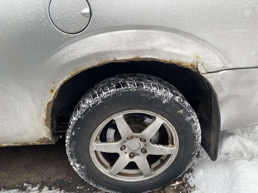 Grey Chrysler Grand Voyager 2004 in Kaunas, with an engine capacity of 3.30 L and mileage of 390 thousand km for 699 €, photo 6 on AUTOMOTO.COM.LV