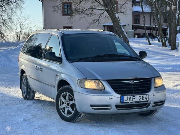Pelēks Chrysler Grand Voyager 2004 Viļņa, ar dzinēja tilpumu 3.30 L un nobraukumu 390 tūkst. km par 999 €, foto 1 vietnē AUTOMOTO.COM.LV