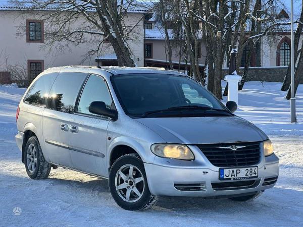 Pelēks Chrysler Grand Voyager 2004 Viļņa, ar dzinēja tilpumu 3.30 L un nobraukumu 390 tūkst. km par 999 €, foto 2 vietnē AUTOMOTO.COM.LV