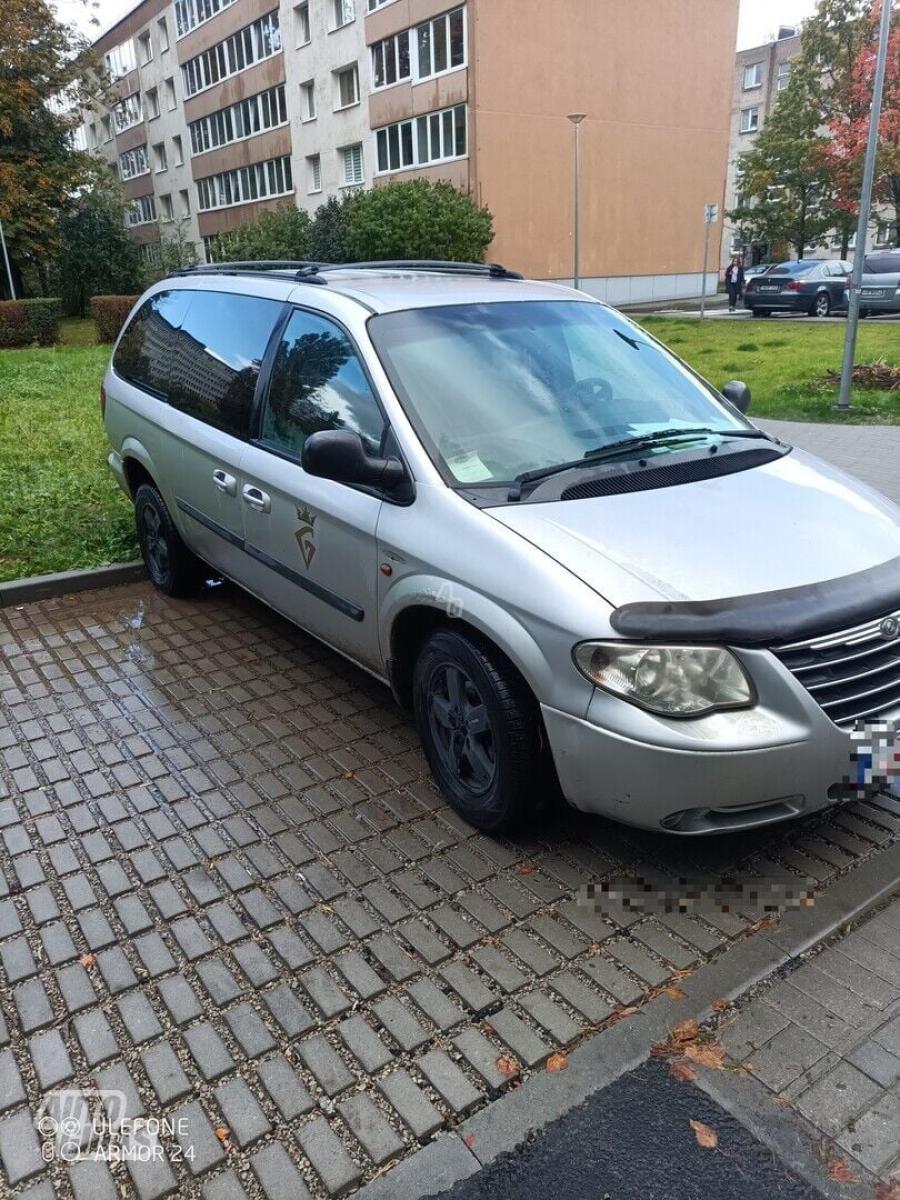 Pelēks Chrysler Grand Voyager 2004 Klaipėda, ar dzinēja tilpumu 2.50 L un nobraukumu 361 tūkst. km par 600 €, foto 1 vietnē AUTOMOTO.COM.LV