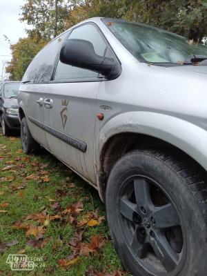 Pelēks Chrysler Grand Voyager 2004 Klaipėda, ar dzinēja tilpumu 2.50 L un nobraukumu 361 tūkst. km par 600 €, foto 7 vietnē AUTOMOTO.COM.LV