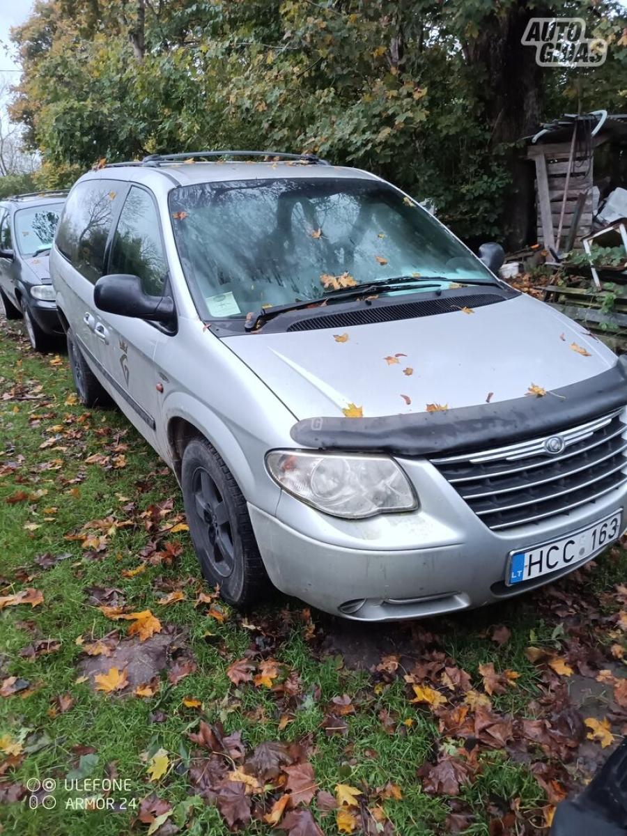 Pelēks Chrysler Grand Voyager 2004 Klaipėda, ar dzinēja tilpumu 2.50 L un nobraukumu 361 tūkst. km par 600 €, foto 11 vietnē AUTOMOTO.COM.LV