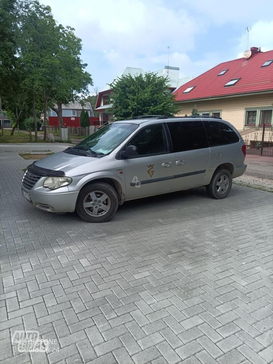 Pelēks Chrysler Grand Voyager 2004 Klaipėda, ar dzinēja tilpumu 2.50 L un nobraukumu 361 tūkst. km par 600 €, foto 12 vietnē AUTOMOTO.COM.LV