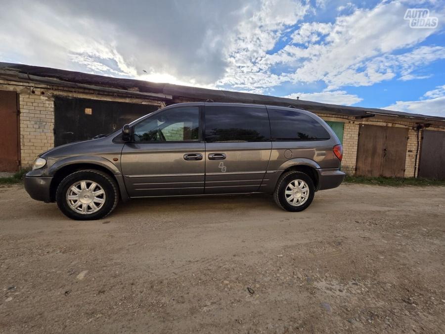Pelēks Chrysler Grand Voyager 2005 Viļņa, ar dzinēja tilpumu 2.80 L un nobraukumu 404 tūkst. km par 750 €, foto 3 vietnē AUTOMOTO.COM.LV