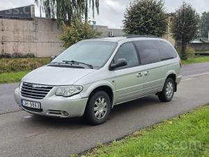 Grey Chrysler Grand Voyager 2005 in Riga, with an engine capacity of 2.80 L and mileage of 480 thousand km for 1190 €, photo 4 on AUTOMOTO.COM.LV