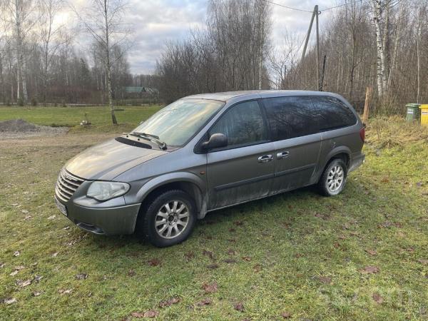 Pelēks Chrysler Grand Voyager 2006 Jelgava, ar dzinēja tilpumu 2.80 L un nobraukumu 367 tūkst. km par 700 €, foto 1 vietnē AUTOMOTO.COM.LV