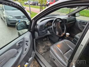Grey Chrysler Grand Voyager 2006 in Valmiera, with an engine capacity of 2.80 L and mileage of 366 thousand km for 700 €, photo 7 on AUTOMOTO.COM.LV