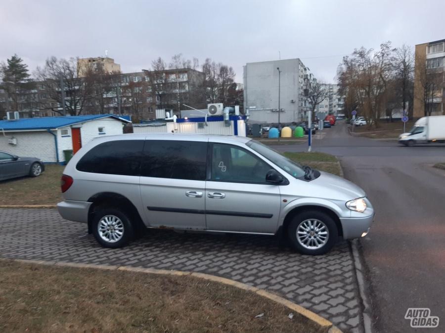 Pelēks Chrysler Grand Voyager 2007 Kauņa, ar dzinēja tilpumu 2.80 L un nobraukumu 300 tūkst. km par 950 €, foto 8 vietnē AUTOMOTO.COM.LV