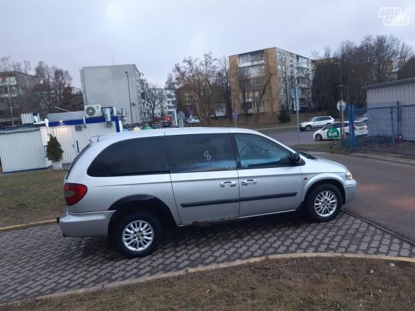 Pelēks Chrysler Grand Voyager 2007 Kauņa, ar dzinēja tilpumu 2.80 L un nobraukumu 300 tūkst. km par 950 €, foto 9 vietnē AUTOMOTO.COM.LV