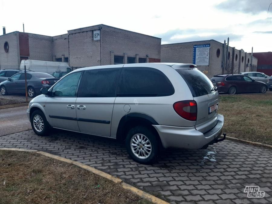 Pelēks Chrysler Grand Voyager 2007 Kauņa, ar dzinēja tilpumu 2.80 L un nobraukumu 300 tūkst. km par 950 €, foto 13 vietnē AUTOMOTO.COM.LV