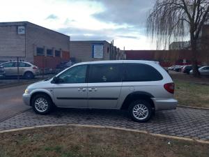 Pelēks Chrysler Grand Voyager 2007 Kauņa, ar dzinēja tilpumu 2.80 L un nobraukumu 300 tūkst. km par 950 €, foto 14 vietnē AUTOMOTO.COM.LV