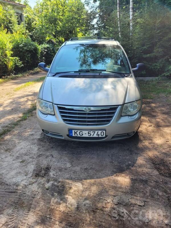 Pelēks Chrysler Grand Voyager 2007 Rīga, ar dzinēja tilpumu 2.80 L un nobraukumu 203 tūkst. km par 1200 €, foto 2 vietnē AUTOMOTO.COM.LV