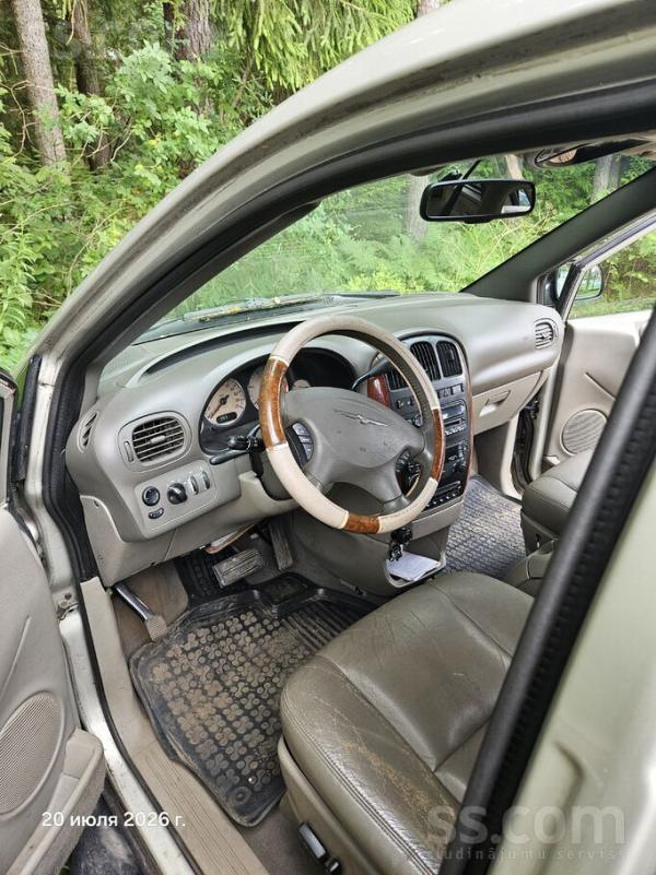 Pelēks Chrysler Grand Voyager 2007 Rīga, ar dzinēja tilpumu 2.80 L un nobraukumu 203 tūkst. km par 1200 €, foto 6 vietnē AUTOMOTO.COM.LV