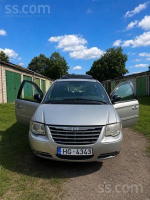 Pelēks Chrysler Grand Voyager 2009 Rīga, ar dzinēja tilpumu 2.80 L un nobraukumu 166 tūkst. km par 2700 €, foto 5 vietnē AUTOMOTO.COM.LV