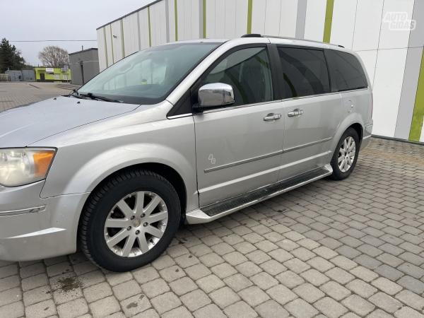 Pelēks Chrysler Grand Voyager 2010 Raseiniai, ar dzinēja tilpumu 2.80 L un nobraukumu 300 tūkst. km par 2500 €, foto 5 vietnē AUTOMOTO.COM.LV