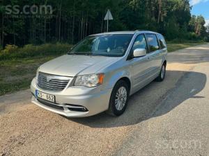 Grey Chrysler Grand Voyager 2012 in Riga, with an engine capacity of 2.80 L and mileage of 375 thousand km for 4500 €, photo 3 on AUTOMOTO.COM.LV