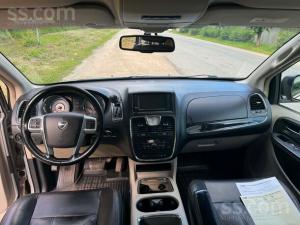 Grey Chrysler Grand Voyager 2012 in Riga, with an engine capacity of 2.80 L and mileage of 375 thousand km for 4500 €, photo 12 on AUTOMOTO.COM.LV