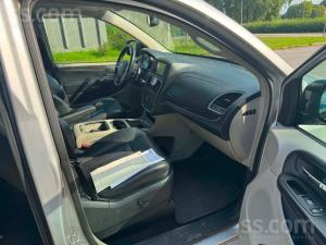 Grey Chrysler Grand Voyager 2012 in Riga, with an engine capacity of 2.80 L and mileage of 375 thousand km for 4500 €, photo 13 on AUTOMOTO.COM.LV