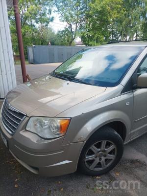 Orange Chrysler Grand Voyager 2009 in Riga, with an engine capacity of 2.80 L and mileage of 289 thousand km for 1550 €, photo 3 on AUTOMOTO.COM.LV