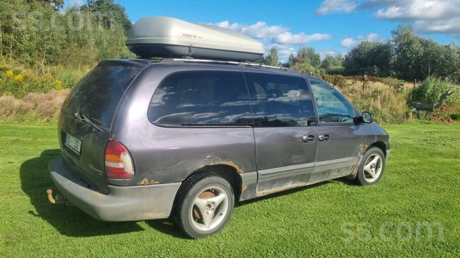 Violet Chrysler Grand Voyager 1996 in Ogre, with an engine capacity of 3.30 L and mileage of 530 thousand km for 450 €, photo 5 on AUTOMOTO.COM.LV