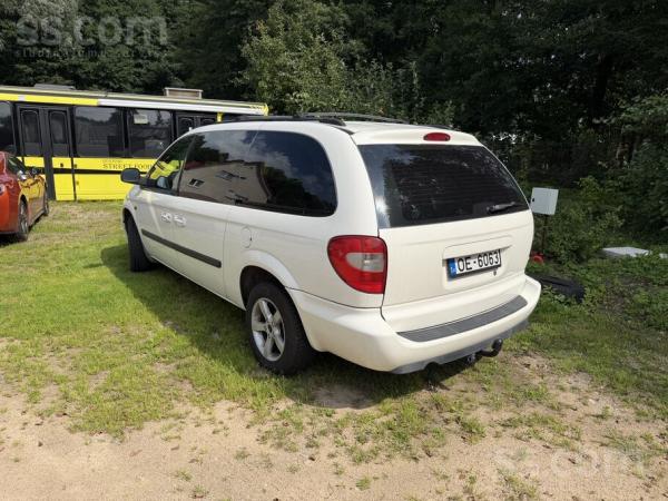 White Chrysler Grand Voyager 2006 in Ogre, with an engine capacity of 3.30 L and mileage of 225 thousand km for 4100 €, photo 3 on AUTOMOTO.COM.LV