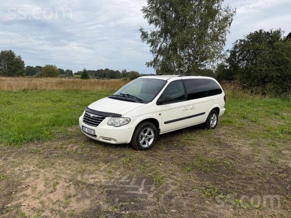 White Chrysler Grand Voyager 2006 in Riga, with an engine capacity of 3.30 L and mileage of 225 thousand km for 4400 €, photo 3 on AUTOMOTO.COM.LV