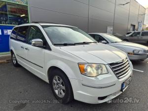 White Chrysler Grand Voyager 2008 in Tallinn, with an engine capacity of 2.80 L and mileage of 317 thousand km for 1499 €, photo 4 on AUTOMOTO.COM.LV