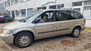 Yellow Chrysler Grand Voyager 2006 in Riga, with an engine capacity of 2.80 L and mileage of 248 thousand km for 600 €, photo  on AUTOMOTO.COM.LV
