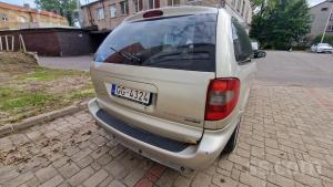 Yellow Chrysler Grand Voyager 2006 in Riga, with an engine capacity of 2.80 L and mileage of 248 thousand km for 600 €, photo 4 on AUTOMOTO.COM.LV